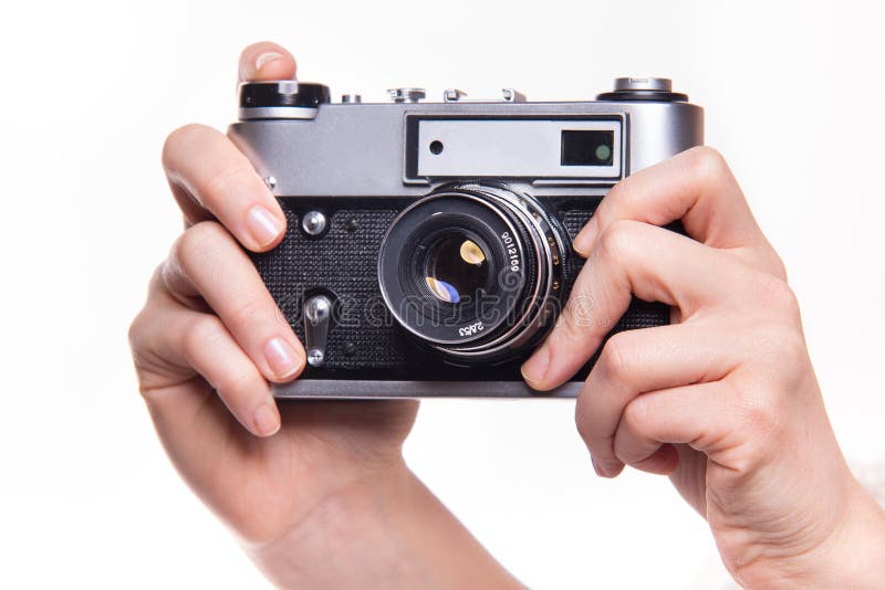 Classic 35mm Photo Camera in Hand Stock Image - Image of single, retr ...