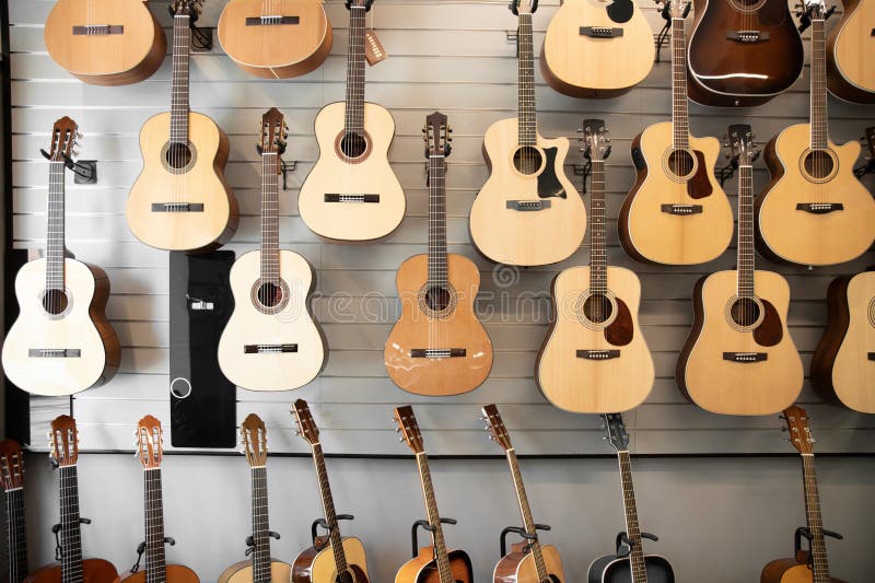 Classic Musical Guitar Instruments on Display in a Music Shop Editorial ...