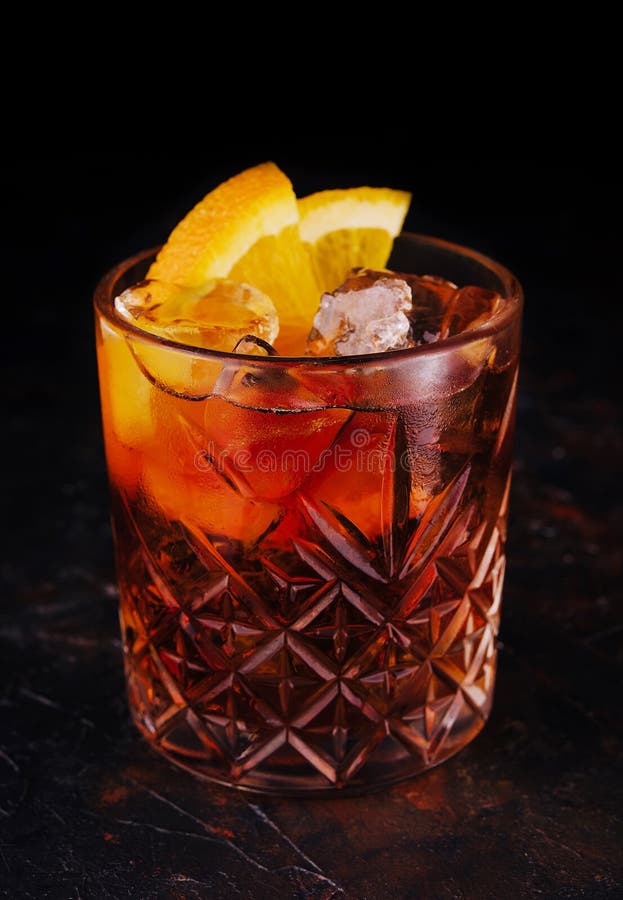 Classic Negroni Cocktail with Orange Slices in Glass Stock Photo ...