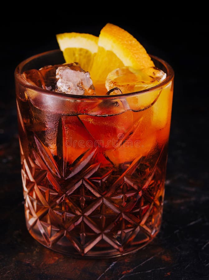 Classic Negroni Cocktail with Orange Slices in Glass Stock Photo ...
