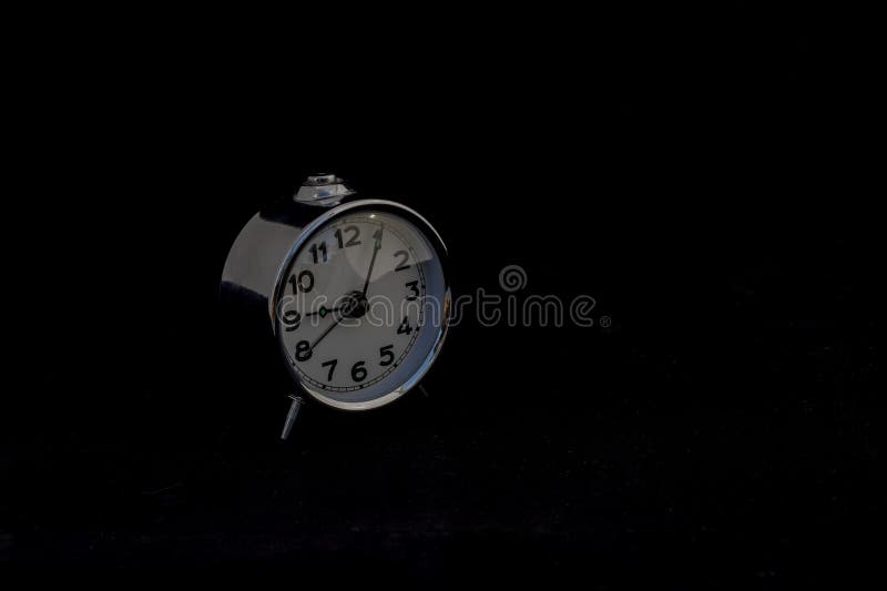 Classic Old Collectible Alarm Clock on Black Background with Space for ...