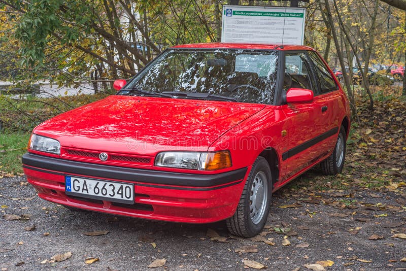 Classic Old Red Mazda 323 E Hatchback Private Car Parked Editorial ...