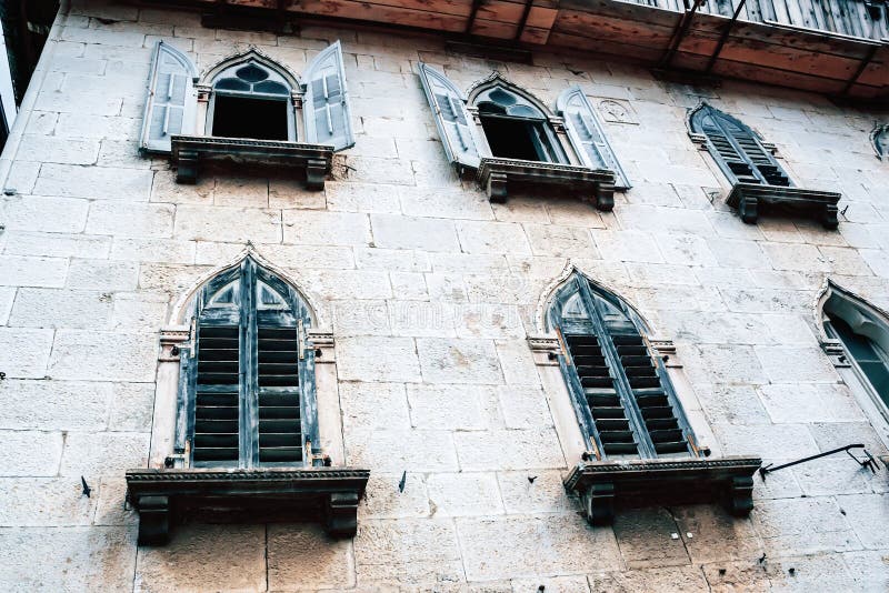 Classic Old Windows on a Stone Wall. Elements of European Traditional ...