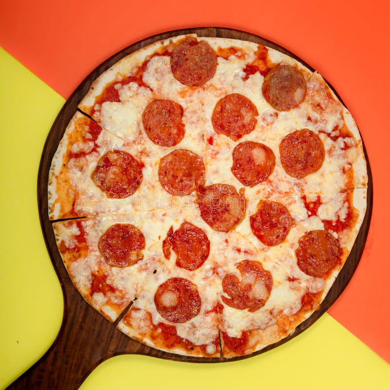 Classic Pepperoni Pizza on Colour Background Stock Image - Image of ...