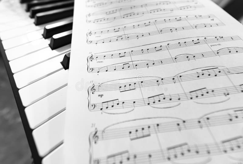 Classic Piano and Musical Sheet . Black and White Photo, Musical ...