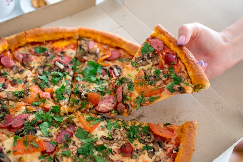 Classic pizza in a box stock photo. Image of crust, holding - 93767540