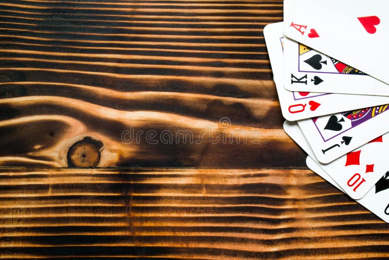 Classic Playing Cards on Dark Brown Wooden Table. Scattered Cards Stock ...
