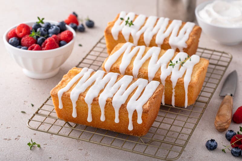 Classic Pound Cake with Powdered Sugar Glaze Dripping Over Stock Photo ...