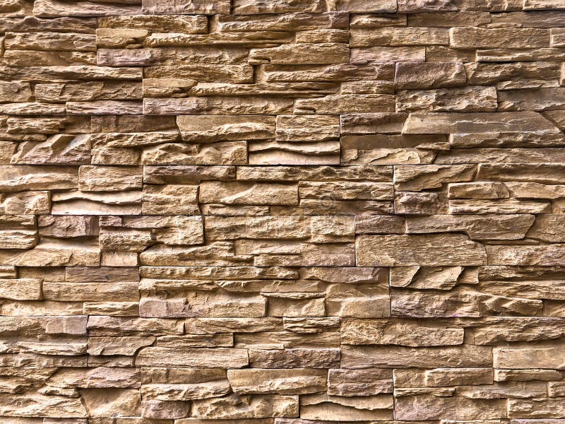 Classic Random Light Brown Brick Arranged on the Wall for Decorate ...