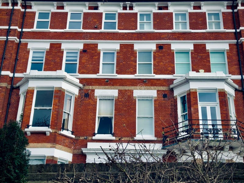 Classic Red Brick Building Facade Stock Photo - Image of facade, street ...