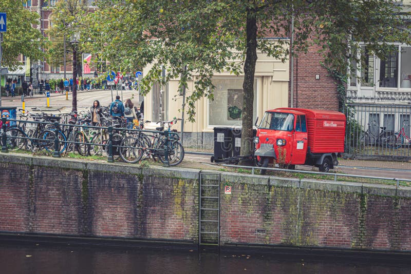 Classic Piaggio APE Three-wheeler Parked on the Street Editorial Stock ...