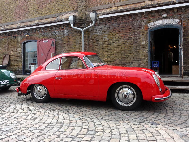 Classic Red Porsche 356 Coupe Parked on a Cobblestone Road Editorial ...