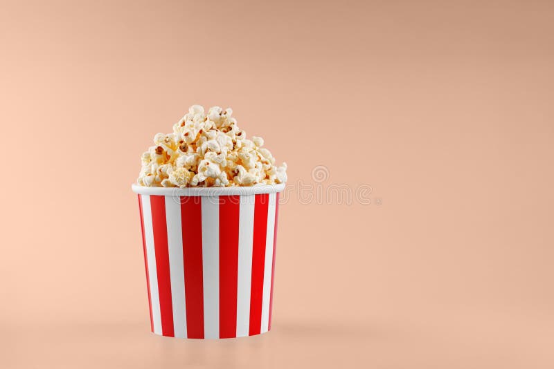 Classic Red Striped Popcorn Cardboard Cup on Orange Background Stock ...