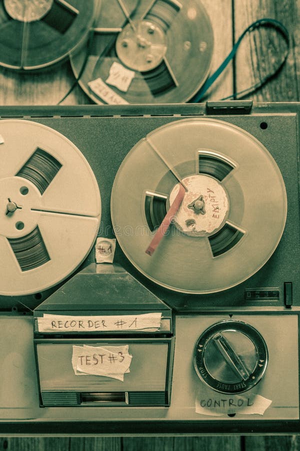 Classic Reel-to-reel Tape Recorder with Microphone and Roll of Tape ...