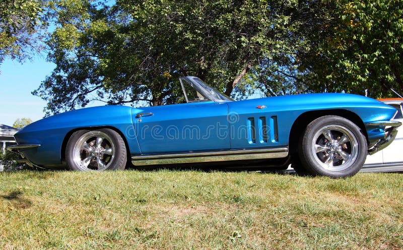 Blue VW convertible by bay stock image. Image of open, bridge - 710889