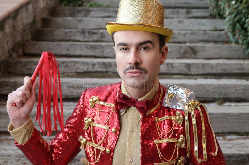 Classic Ringmaster Holding a Red Whip Stock Photo - Image of armed ...