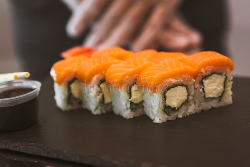 Classic Roll Philadelphia on Black Slate Plate Stock Photo - Image of ...