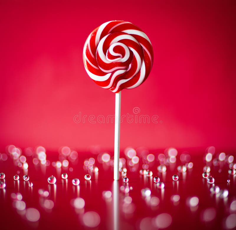 Classic Round Lollipop with a Red and White Spiral Pattern Stock ...