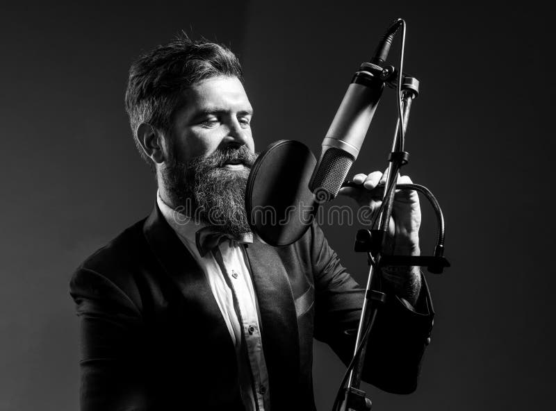 Classic Singer. Man Singing with Music Microphone. Stock Photo - Image ...