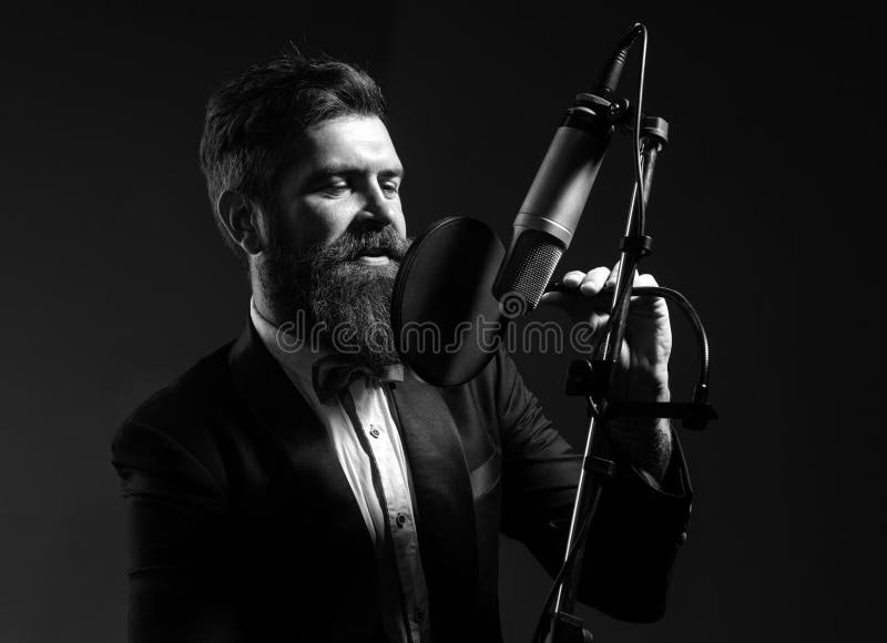 Classic Singer. Man Singing with Music Microphone. Stock Photo - Image ...