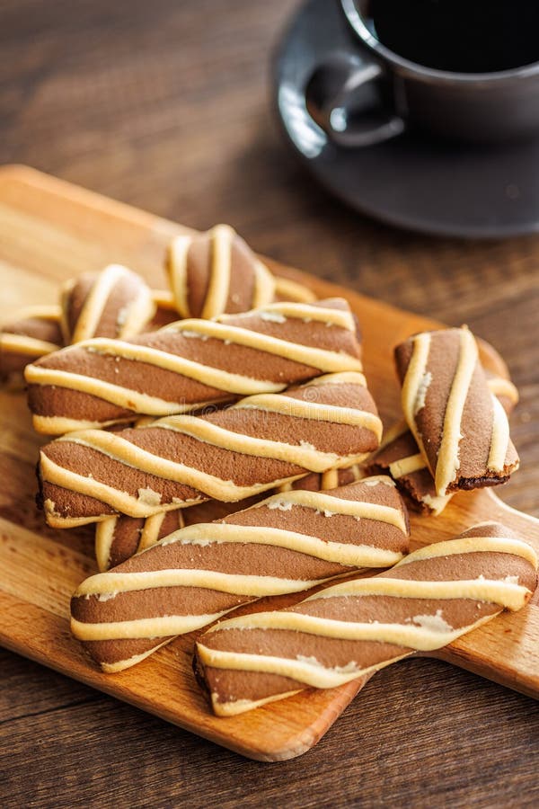 Classic Striped Cookies on Cutting Board on Wooden Table Stock Image ...