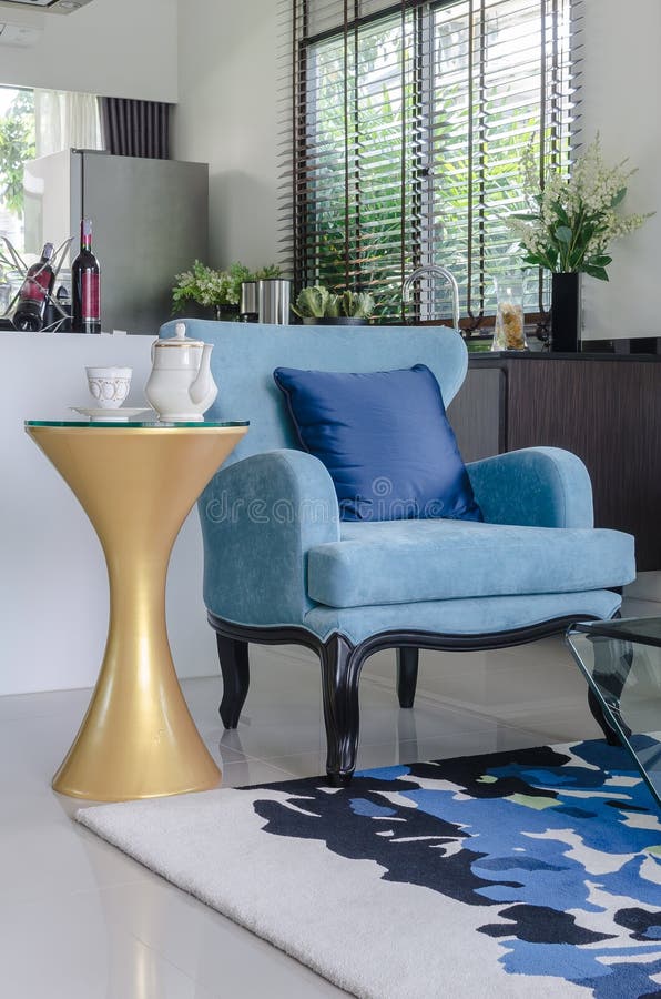 Classic Style Blue Chair with Tea Cup Set on Yellow Table Stock Image ...