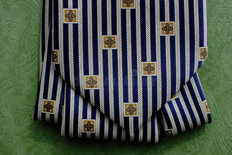 Classic Tie Fabric Texture Close-up with Abstract Pattern on a Green ...