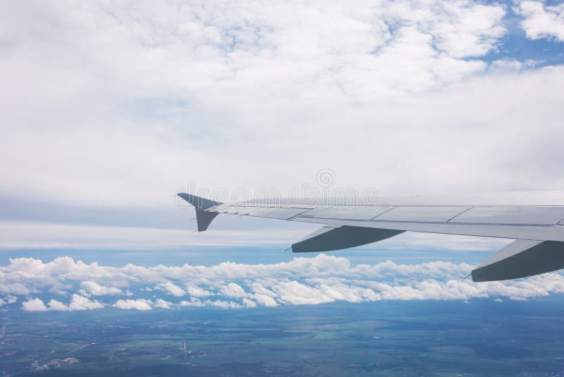 View of the Engine on the Wing of the Aircraft during the Flight in the ...