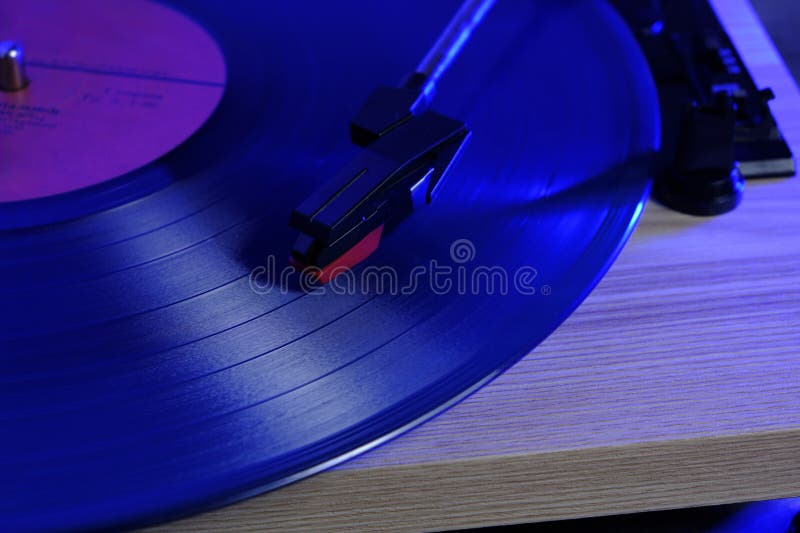 Classic Vinyl Record Player Closeup with Contoured Blue Light. Stock ...