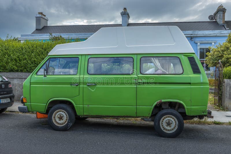 Classic VW Campervan in Green Color Editorial Photo - Image of street ...