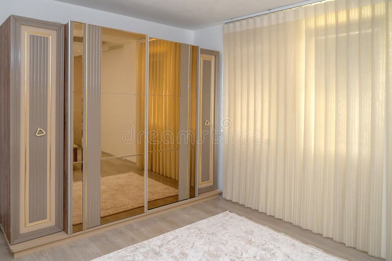 Classic Wardrobe and Drawer in Front of the Brick Wall Stock Image ...