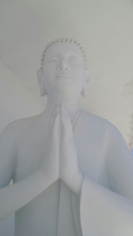 Classic White Sculpture of Buddhist Monk Pay Respect To Buddha Stock ...