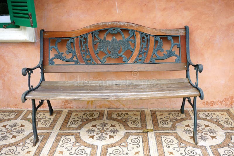 Classic wooden long chair stock image. Image of brick - 79712013