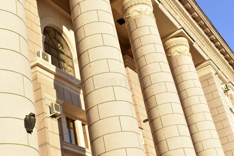 Classic Yellow Large Building with Columns in the Evening Stock Image ...
