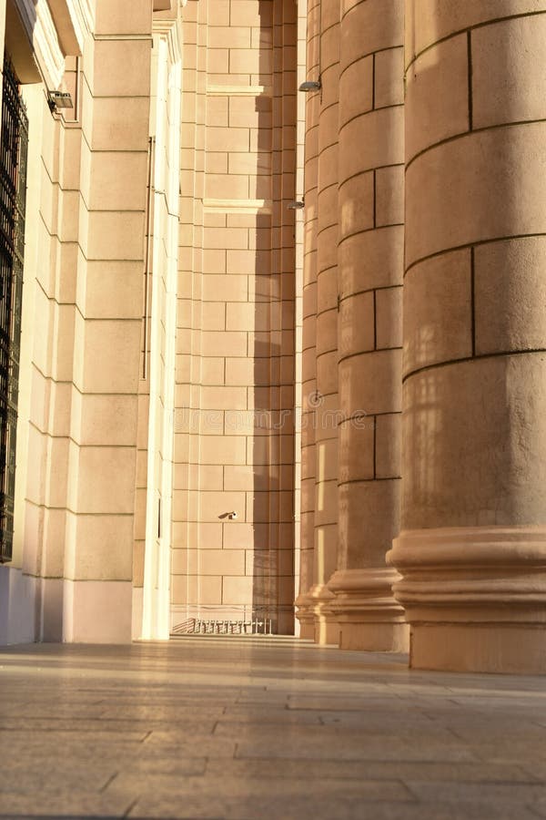 Classic Yellow Large Building with Columns in the Evening Stock Image ...