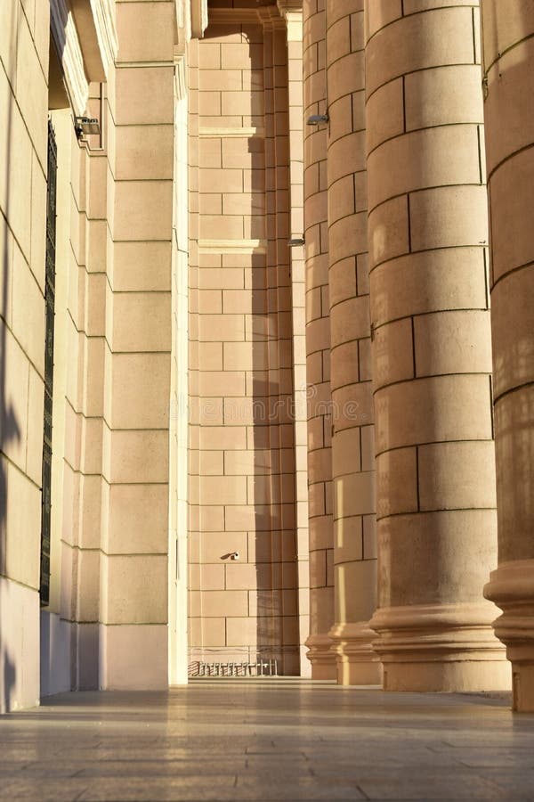 Classic Yellow Large Building with Columns in the Evening Stock Image ...