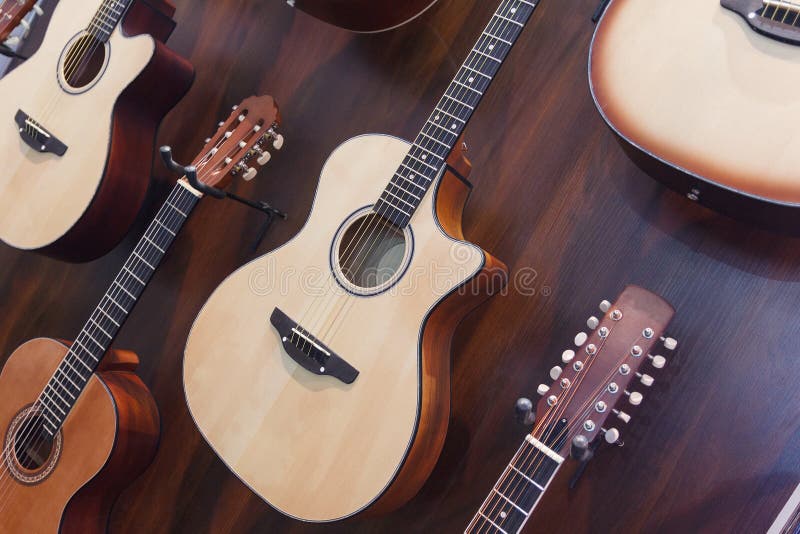 Classical Acoustic Guitars in Musical Store Stock Photo - Image of ...