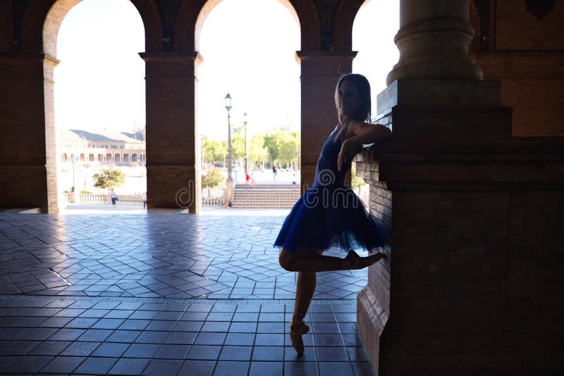 Classical Ballet Dancer Leans on Columns in the Park and Looking at the ...