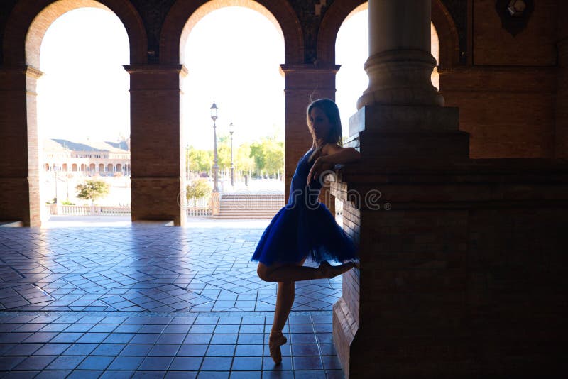 Classical Ballet Dancer Leans on Columns in the Park and Looking at the ...