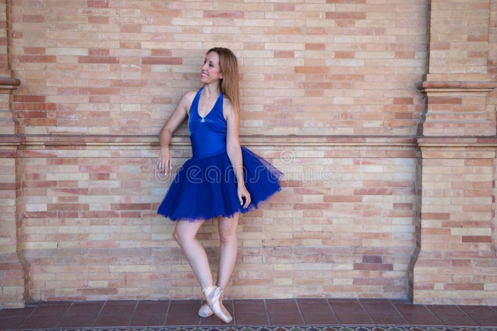 Classical Ballet Dancer with Turkey Blue Tutu Doing Different Poses and ...