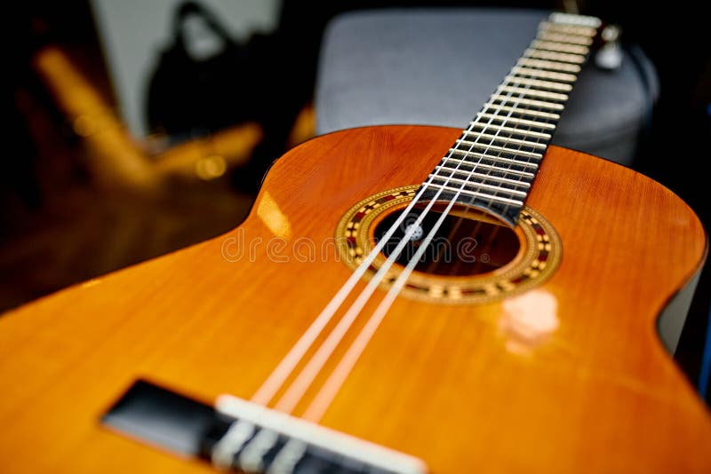 Classical brown guitar stock photo. Image of culture - 140751146