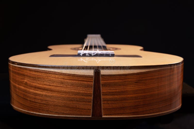 Classical Guitar Isolated on Black Background, View from the Down Side ...