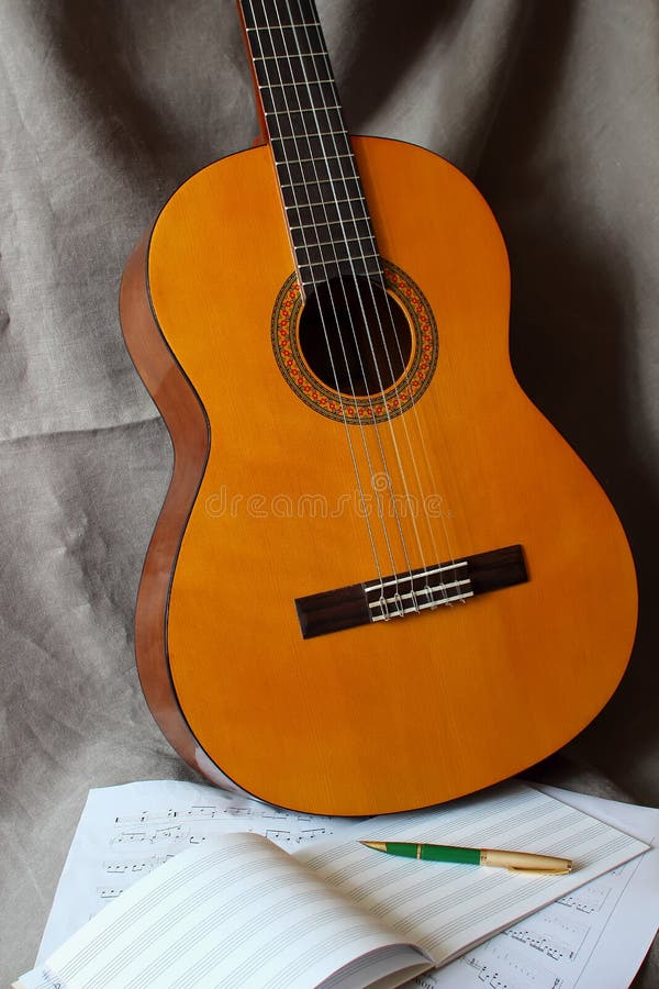 Classical Guitar and Music Books with Pen Stock Image - Image of ...