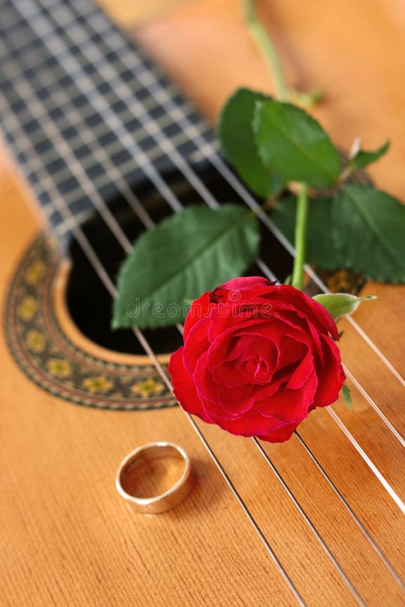 Classical Guitar & Red Rose Stock Photo - Image of love, gift: 12523786