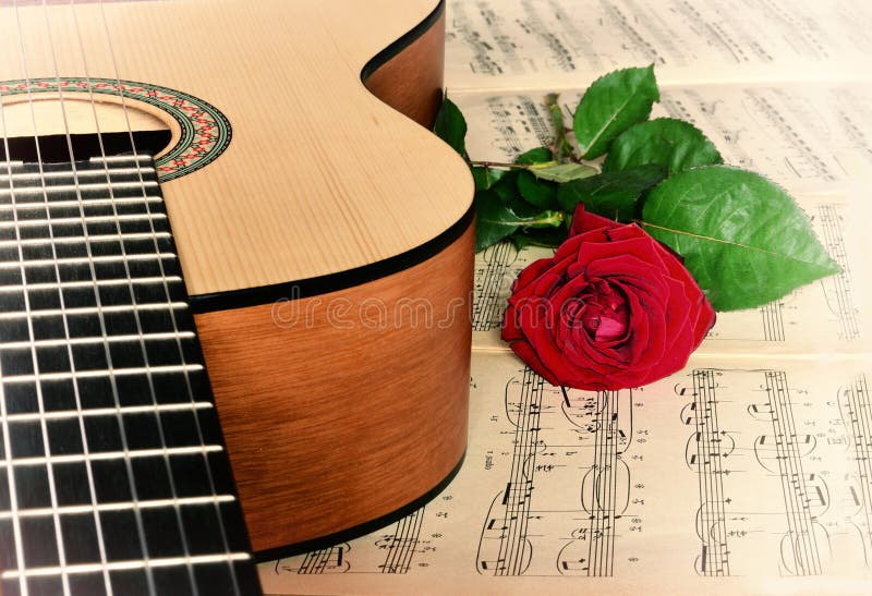 Classical guitar and rose. stock image. Image of leisure - 56787425