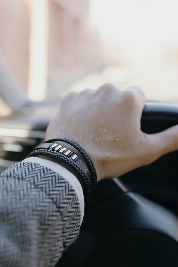 Classical Male Leather Bracelet on a Hand in the Car Stock Image ...