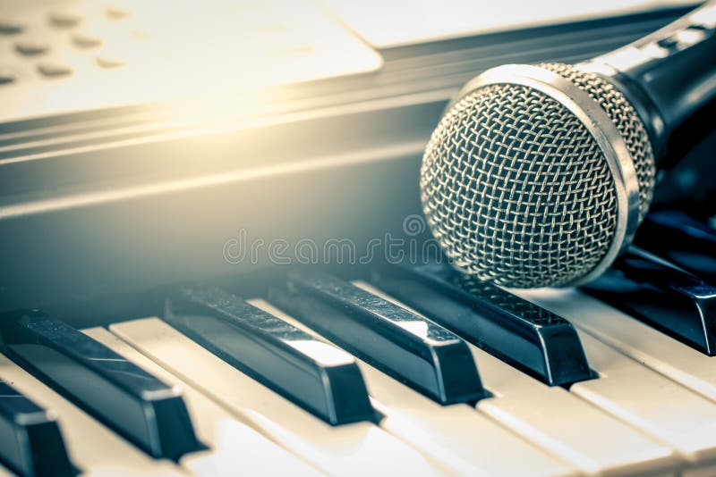 Classical Microphone on Keyboard Stock Image - Image of edge, grunge ...