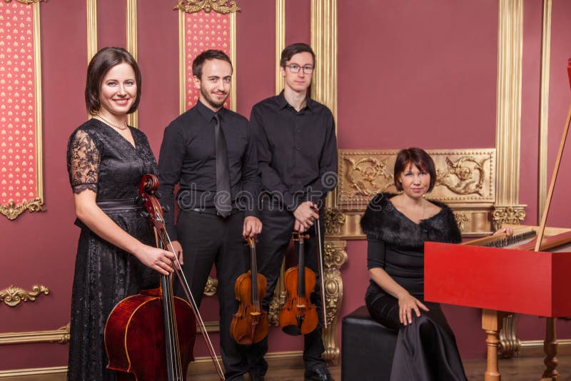 Classical Music Quartet Posing after the Concert. Stock Photo - Image ...