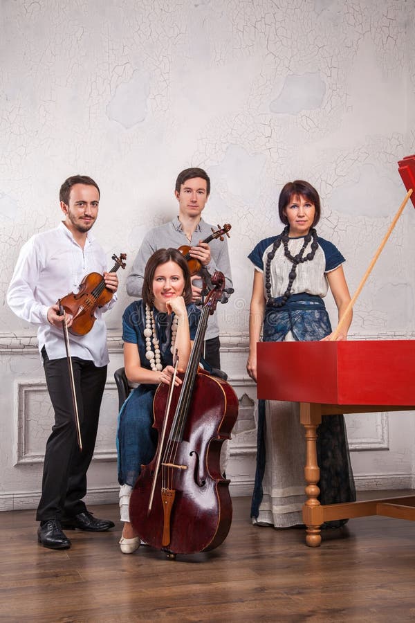 Classical Music Quartet Posing after the Concert. Stock Image - Image ...