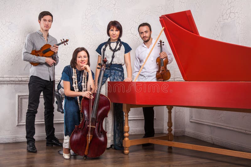 Classical Music Quartet Posing after the Concert. Stock Photo - Image ...